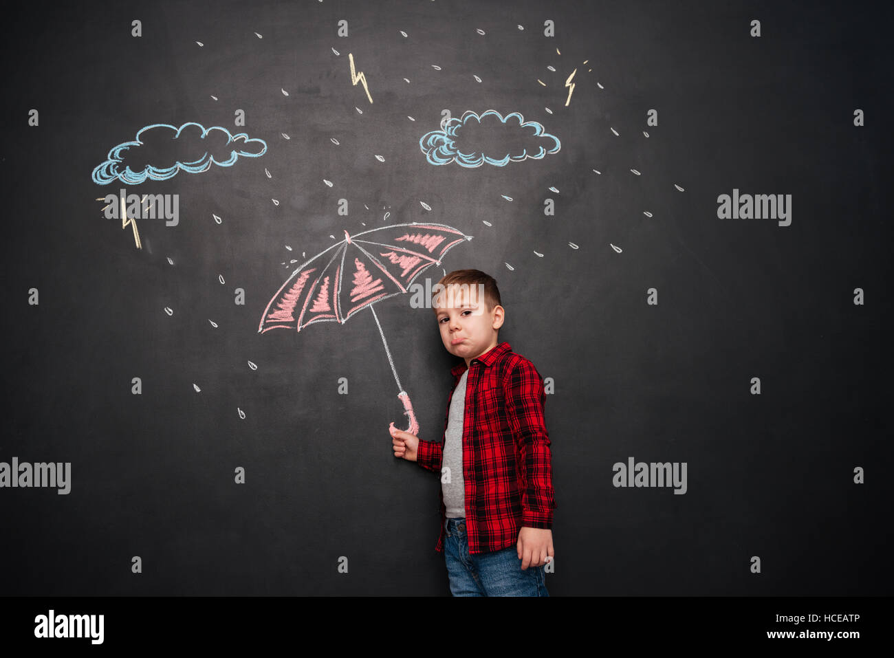 Boy child sad looking at camera hi-res stock photography and images - Alamy
