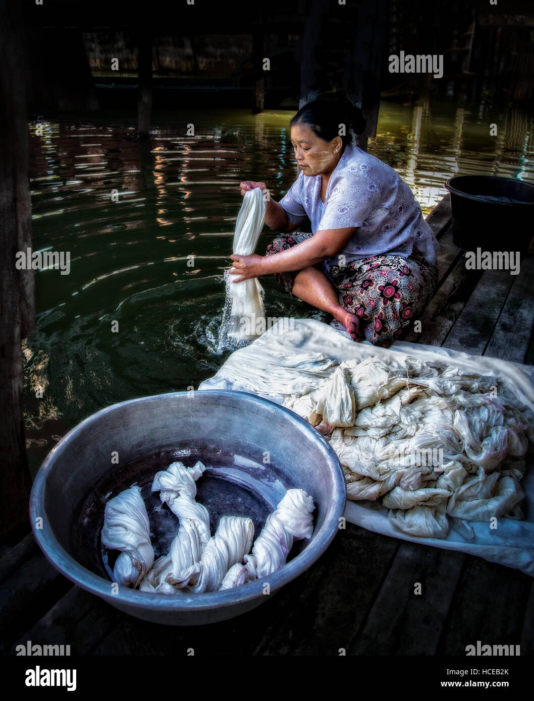 Burmese woman washing hi-res stock photography and images - Alamy