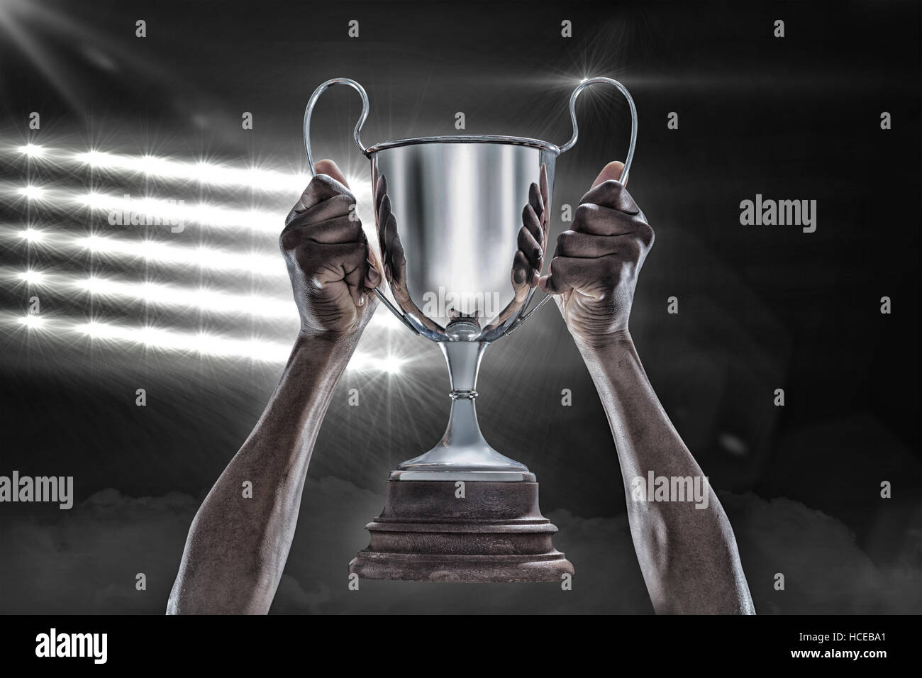 Composite image 3D of cropped hand of athlete holding trophy Stock ...