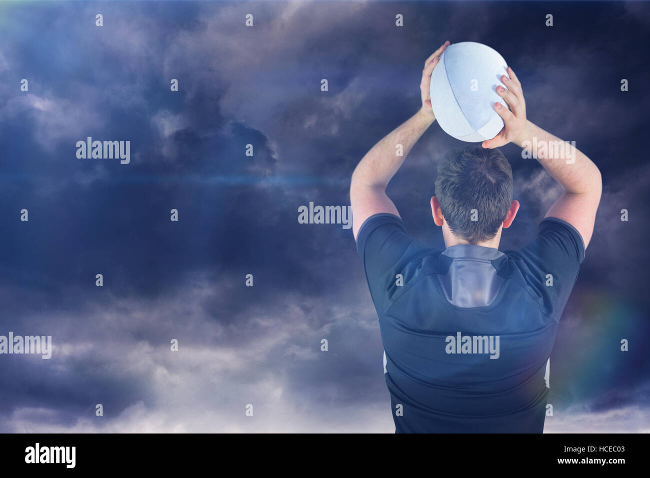 Composite image of back turned rugby player throwing a ball 3D Stock ...