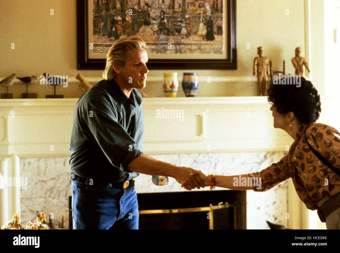 HIDER IN THE HOUSE Gary Busey (left), 1989. ©Vestron/courtesy Everett ...