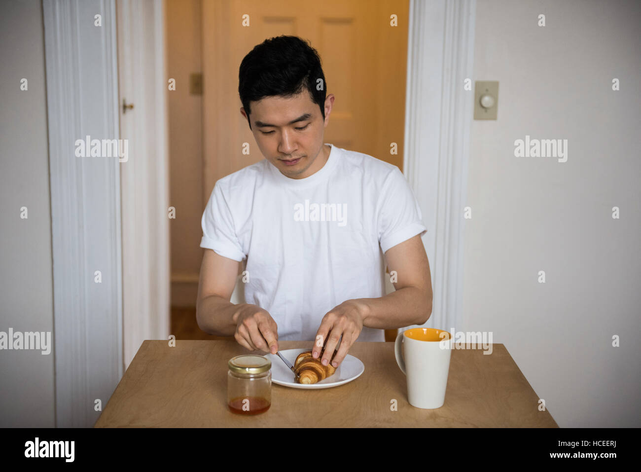 Man having a breakfast at home Stock Photo - Alamy