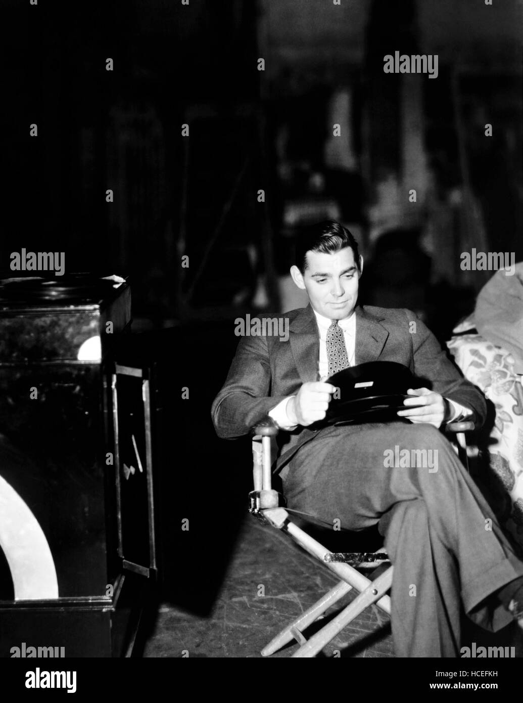HOLD YOUR MAN, Clark Gable sitting in director's chair on set, 1933 ...
