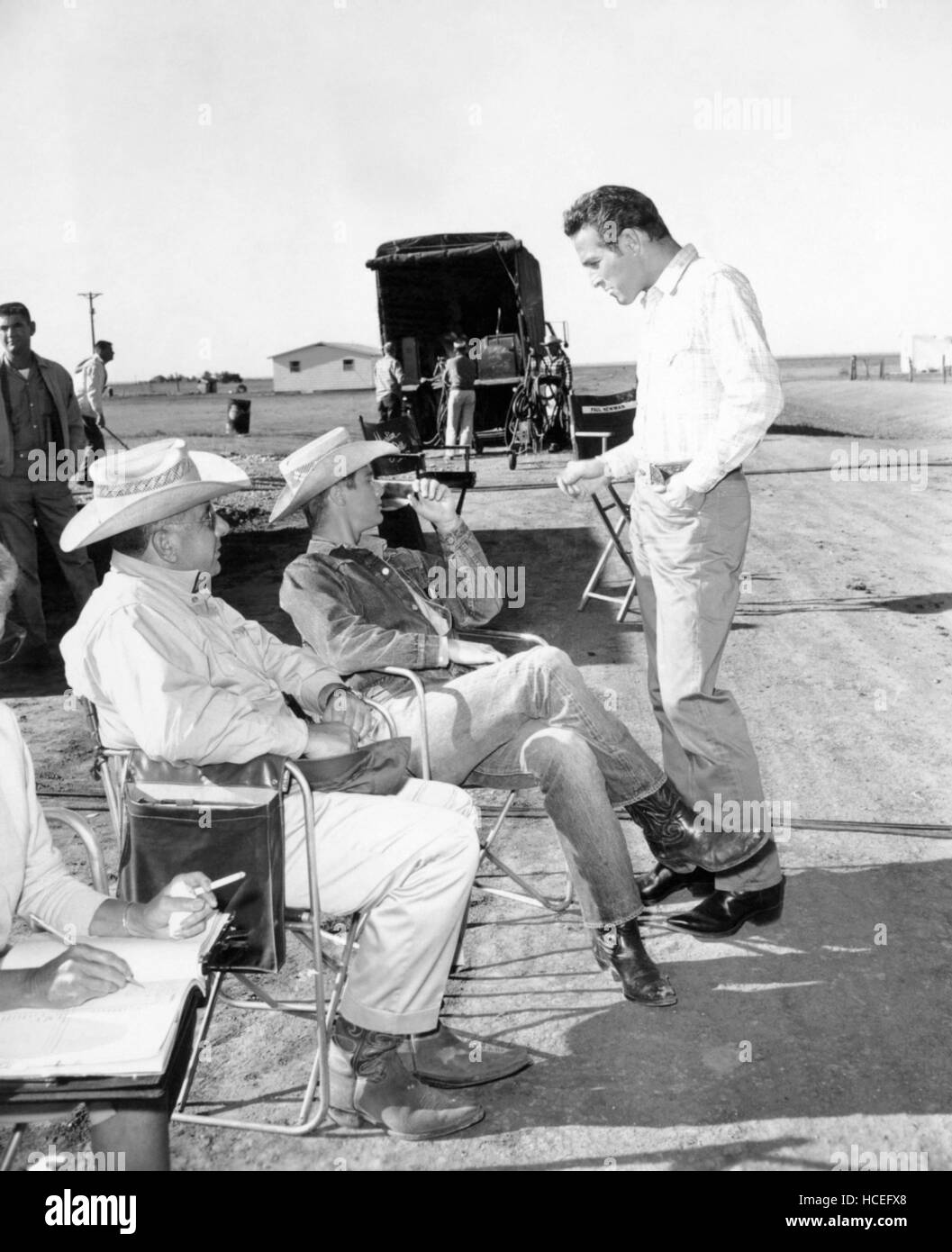 HUD, director Martin Ritt (seated left), Brandon De Wilde (seated ...