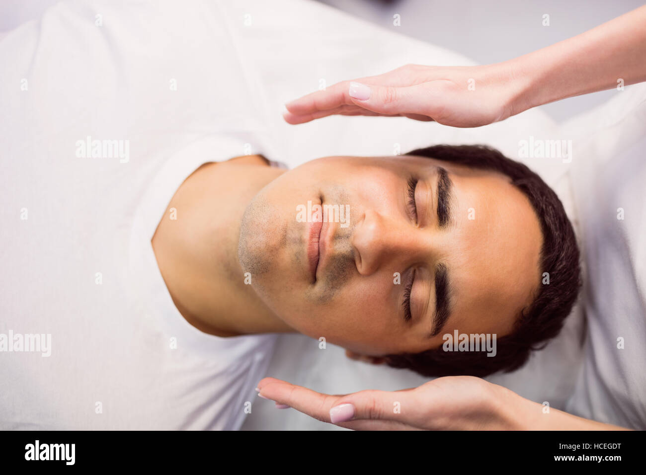 Receiving medical treatment hi-res stock photography and images - Alamy