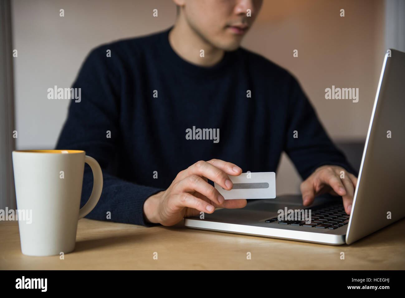 Male shopping laptop hi-res stock photography and images - Alamy