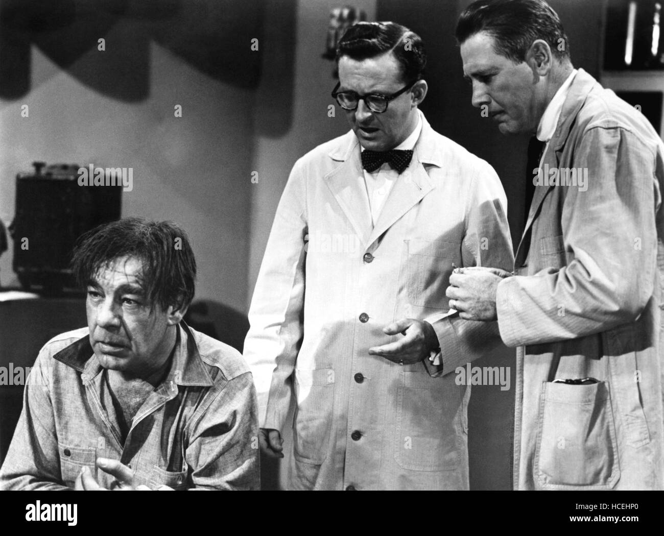 INDESTRUCTIBLE MAN, from left: Lon Chaney Jr, Joe Flynn, Robert Shayne ...