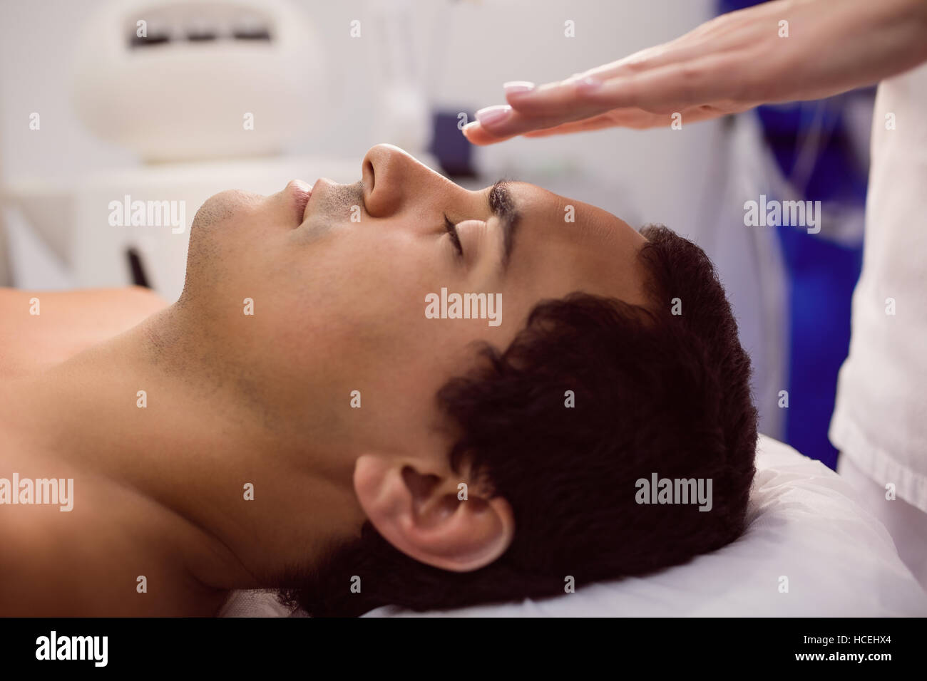 Receiving medical treatment hi-res stock photography and images - Alamy