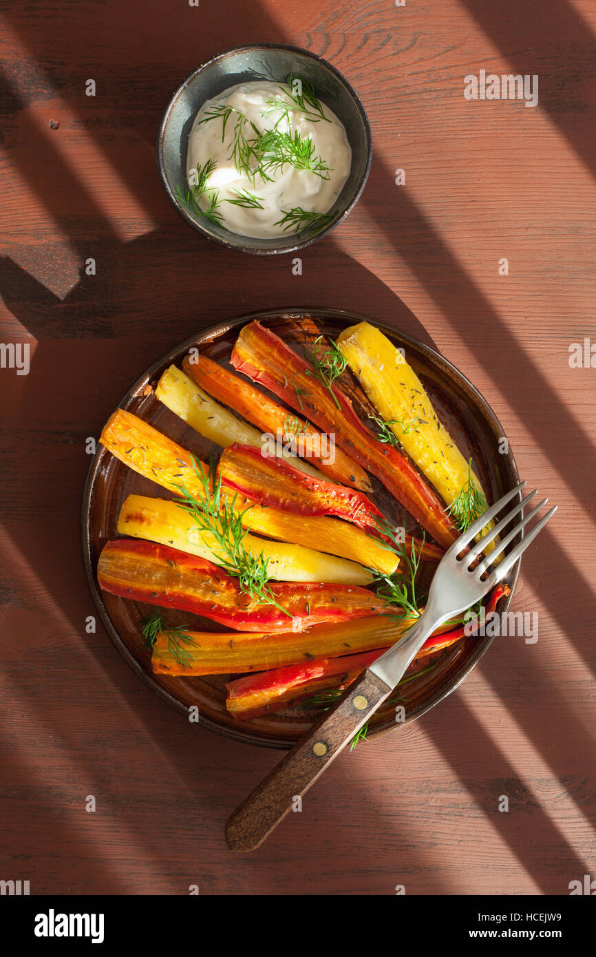 roasted colorful carrots on plate Stock Photo - Alamy