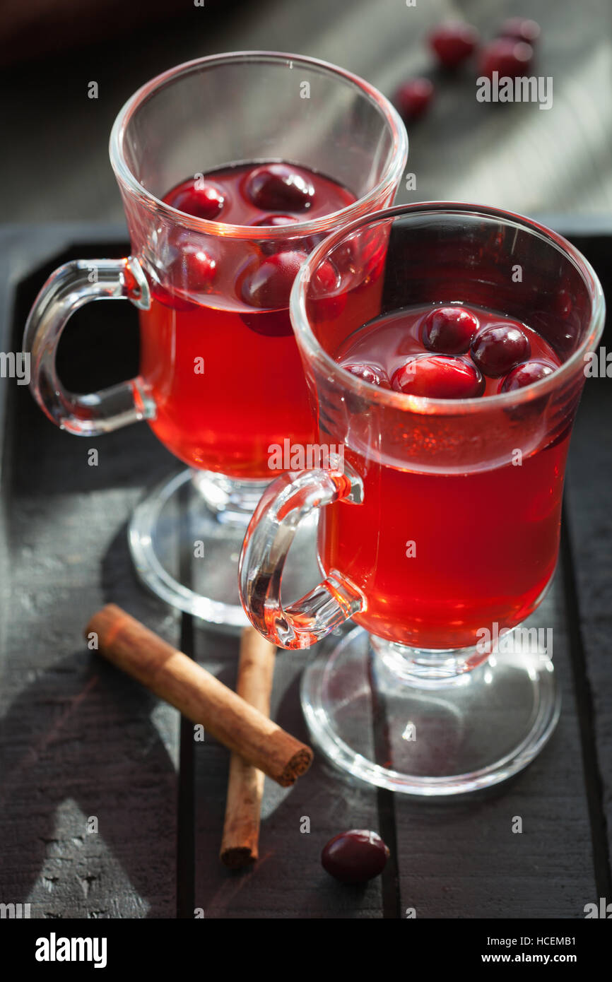 hot cranberry tea with cinnamon warming drink Stock Photo - Alamy