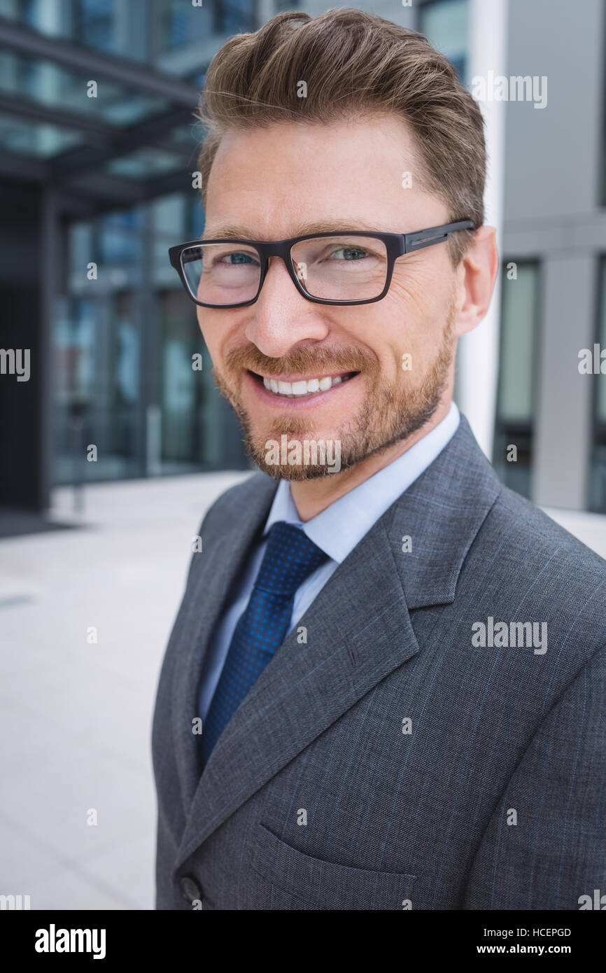 Confident businessman smiling Stock Photo - Alamy Confident businessman smiling Stock Photo - Alamy