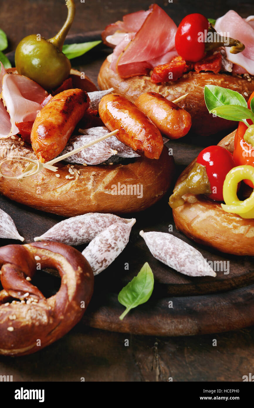 Variety of meat snacks in pretzels Stock Photo - Alamy