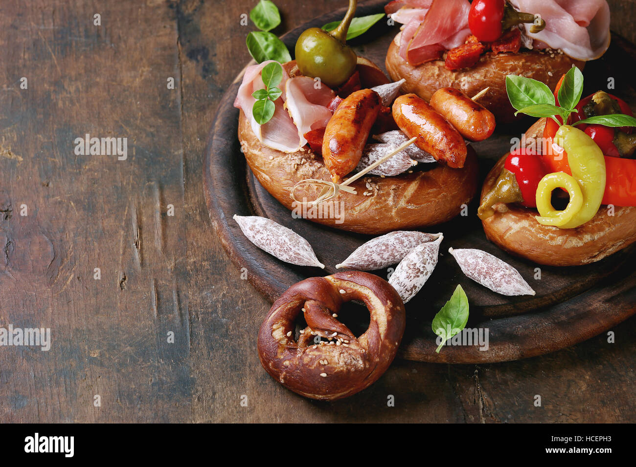 Variety of meat snacks in pretzels Stock Photo - Alamy