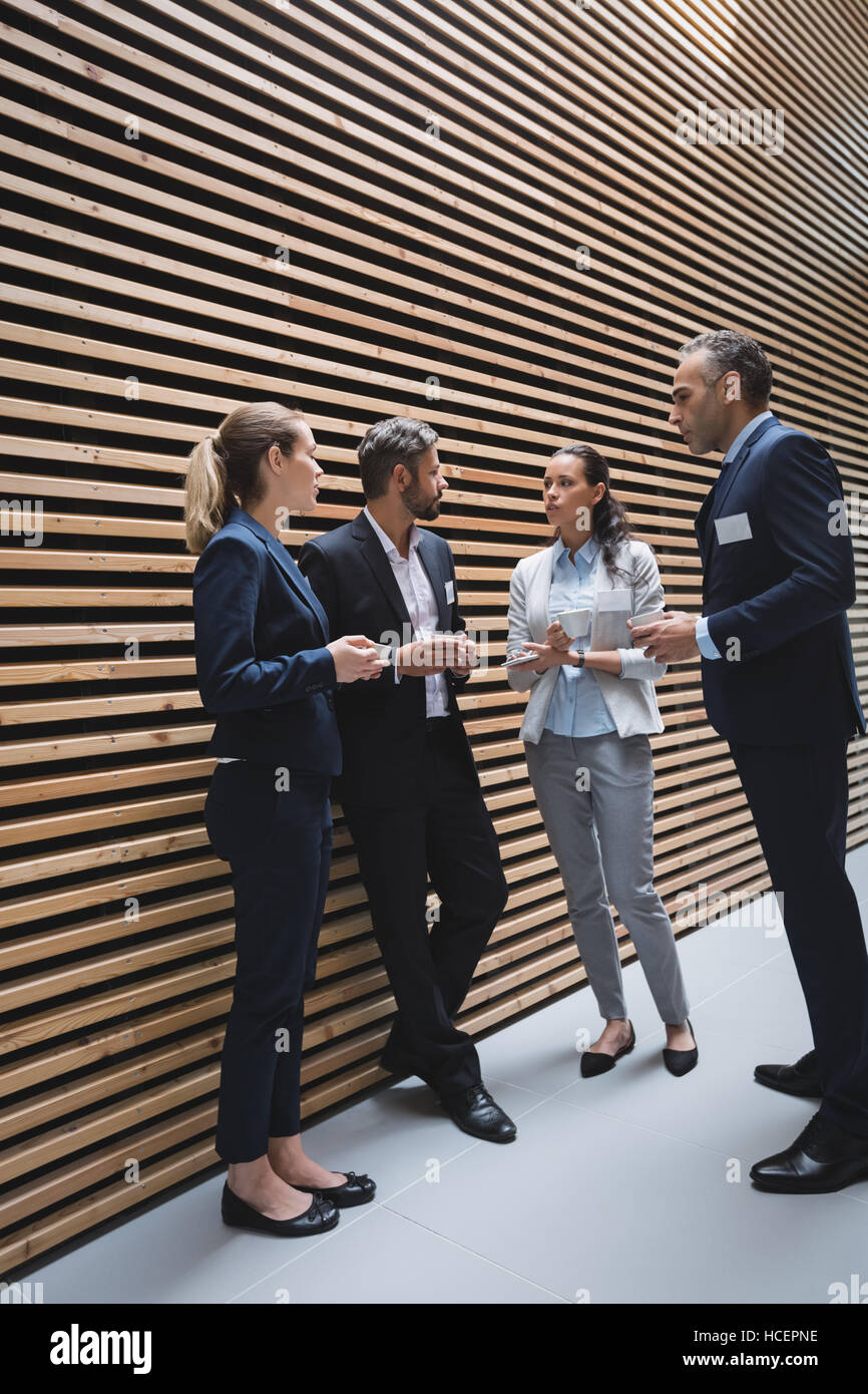 Businesspeople having a discussion Stock Photo - Alamy