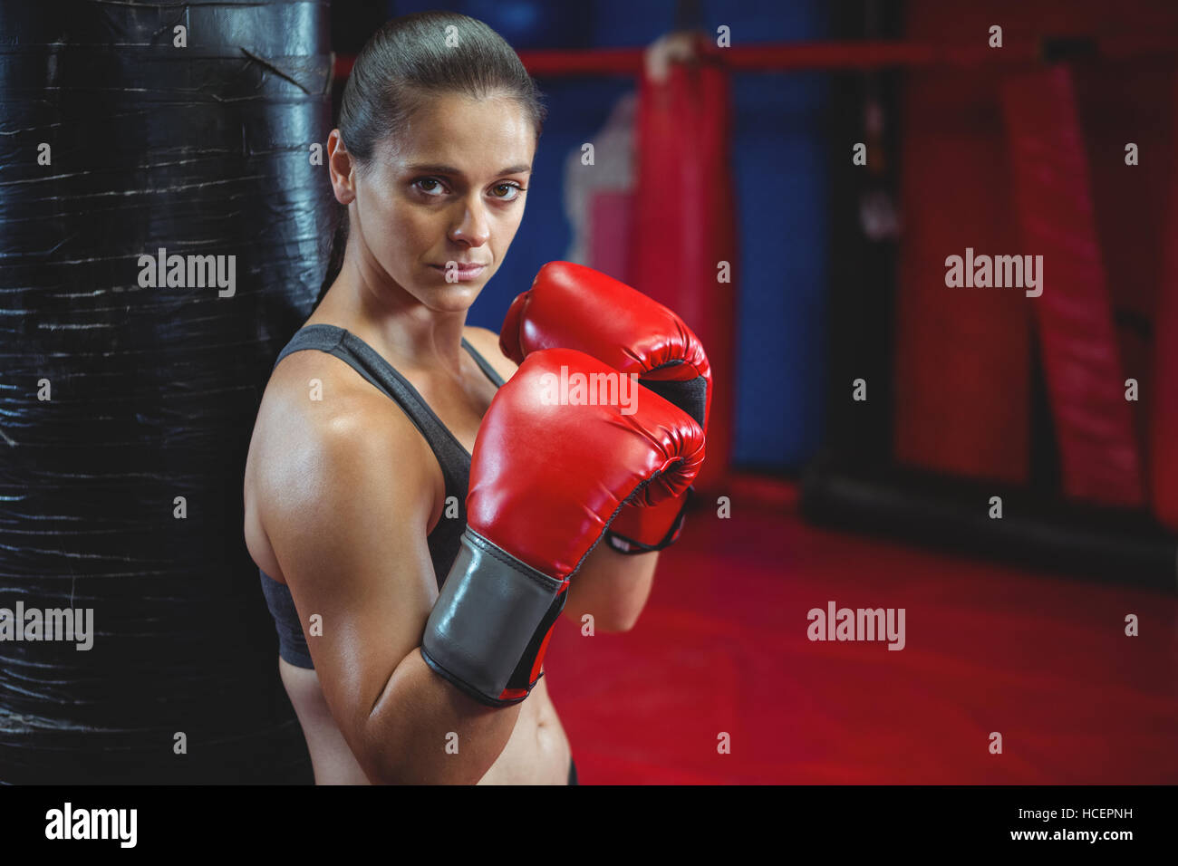 Confident female boxer performing boxing stance Stock Photo - Alamy