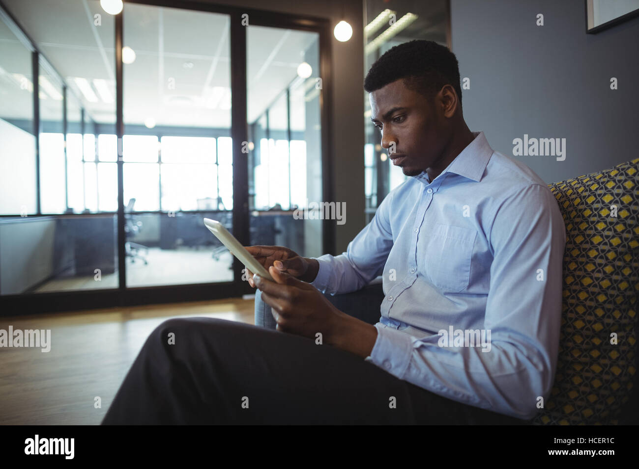 Businessman using digital tablet Stock Photo - Alamy Businessman using digital tablet Stock Photo - Alamy