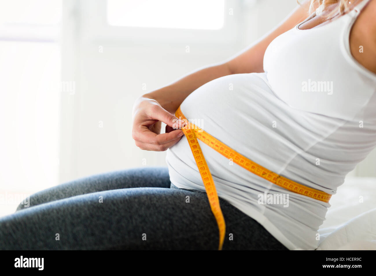 Woman belly tummy hi-res stock photography and images - Alamy