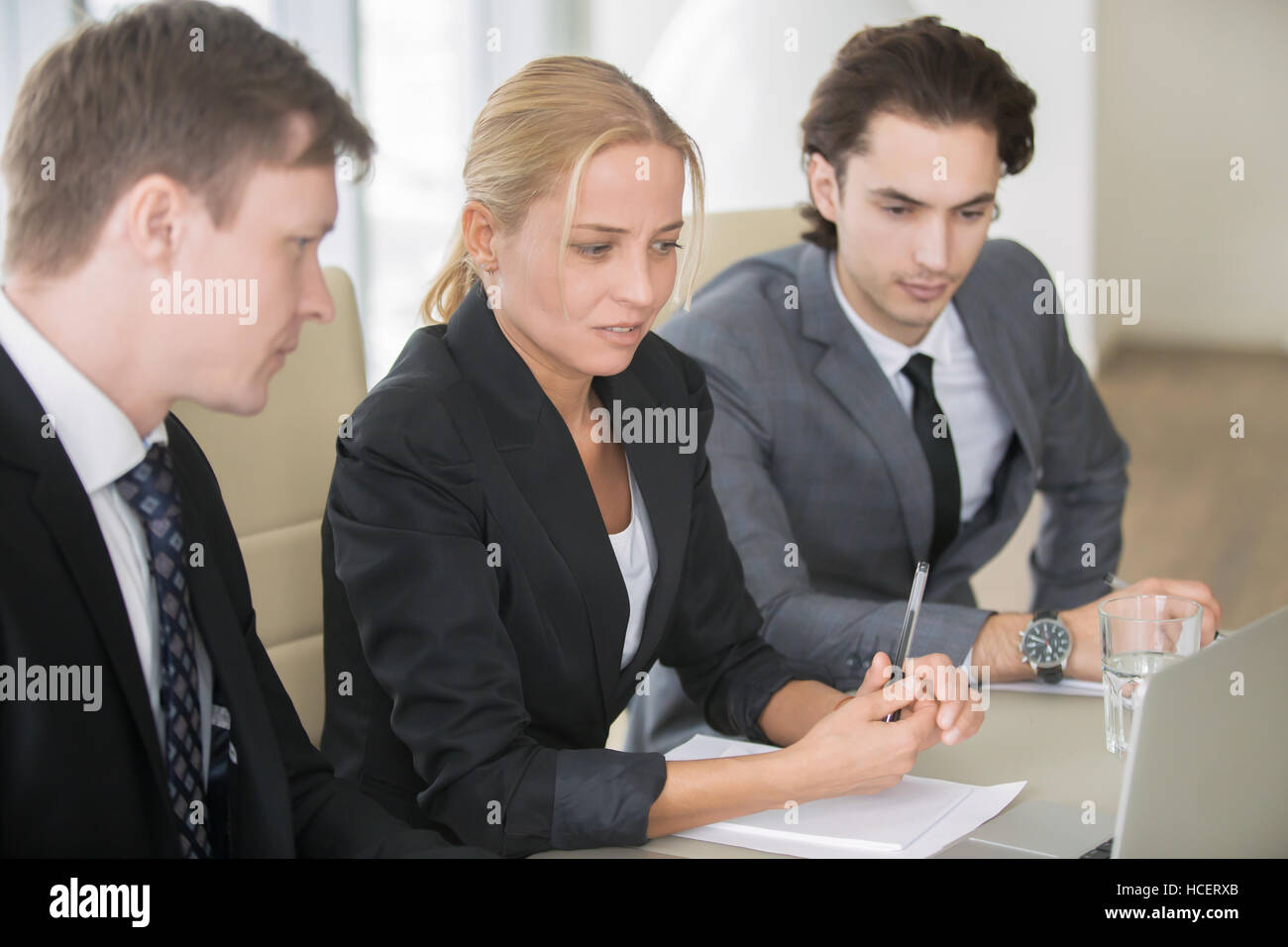 Businesswoman explaining presentation on laptop screen Stock Photo - Alamy