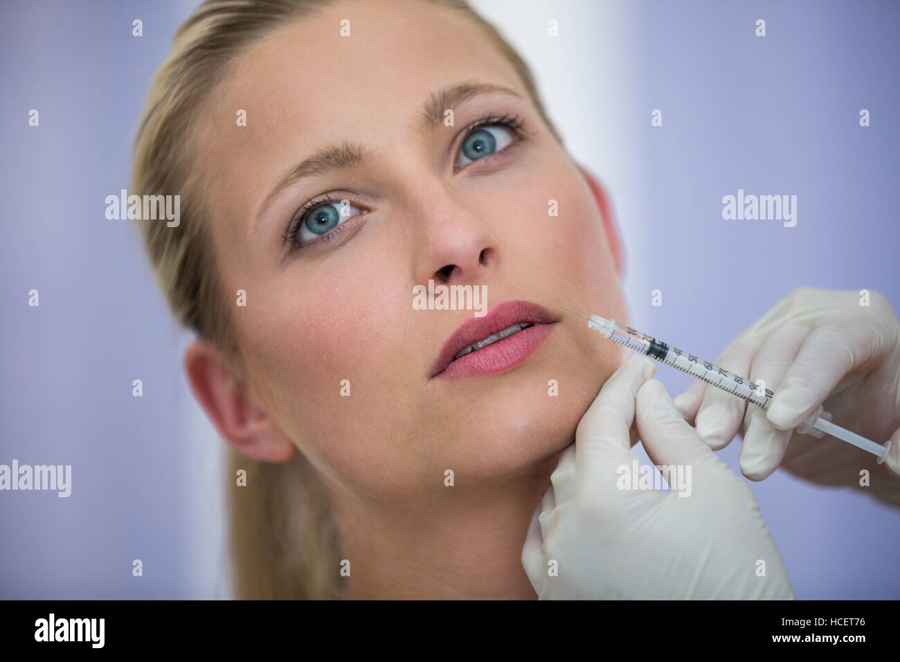 Female patient receiving a botox injection on face Stock Photo - Alamy