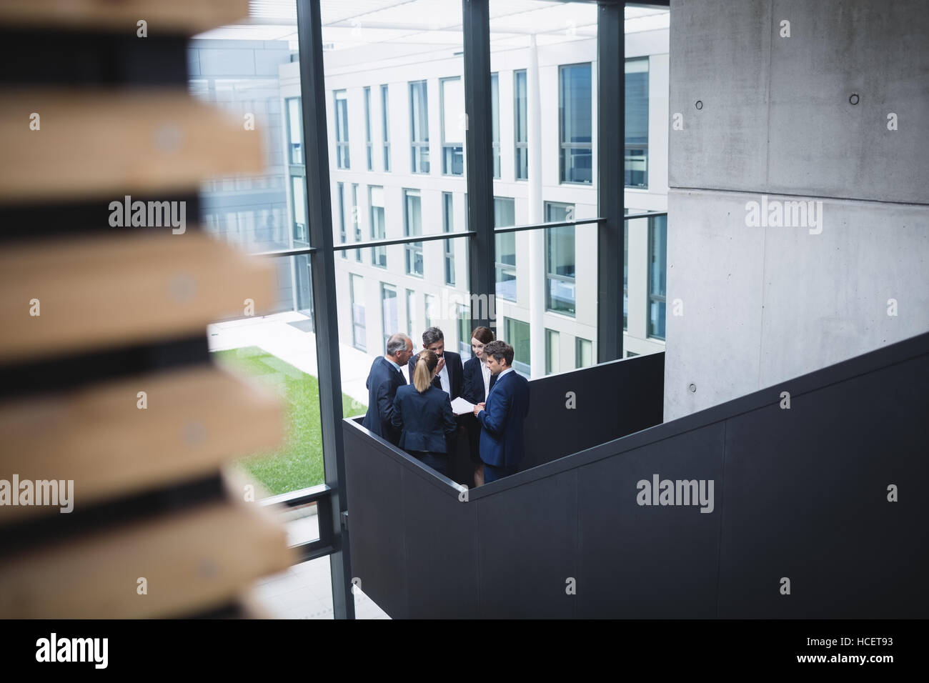 Businesspeople having a discussion in office Stock Photo - Alamy