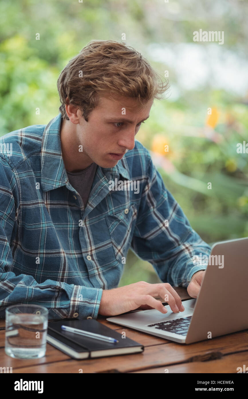 Laptop and home and man hi-res stock photography and images - Alamy