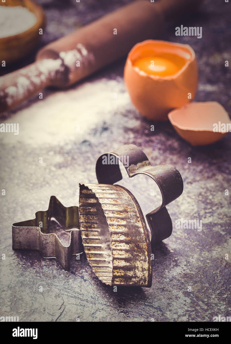 Various shape cookie cutters on table Stock Photo - Alamy