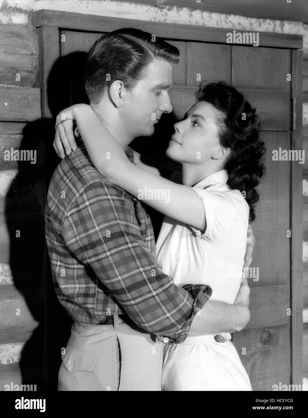 HOT SUMMER NIGHT, from left: Leslie Nielsen, Colleen Miller, 1957 Stock ...