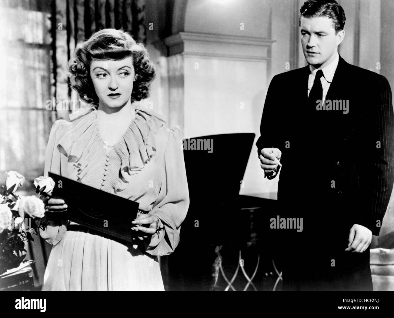 IN THIS OUR LIFE, Bette Davis, Dennis Morgan, 1942 Stock Photo - Alamy