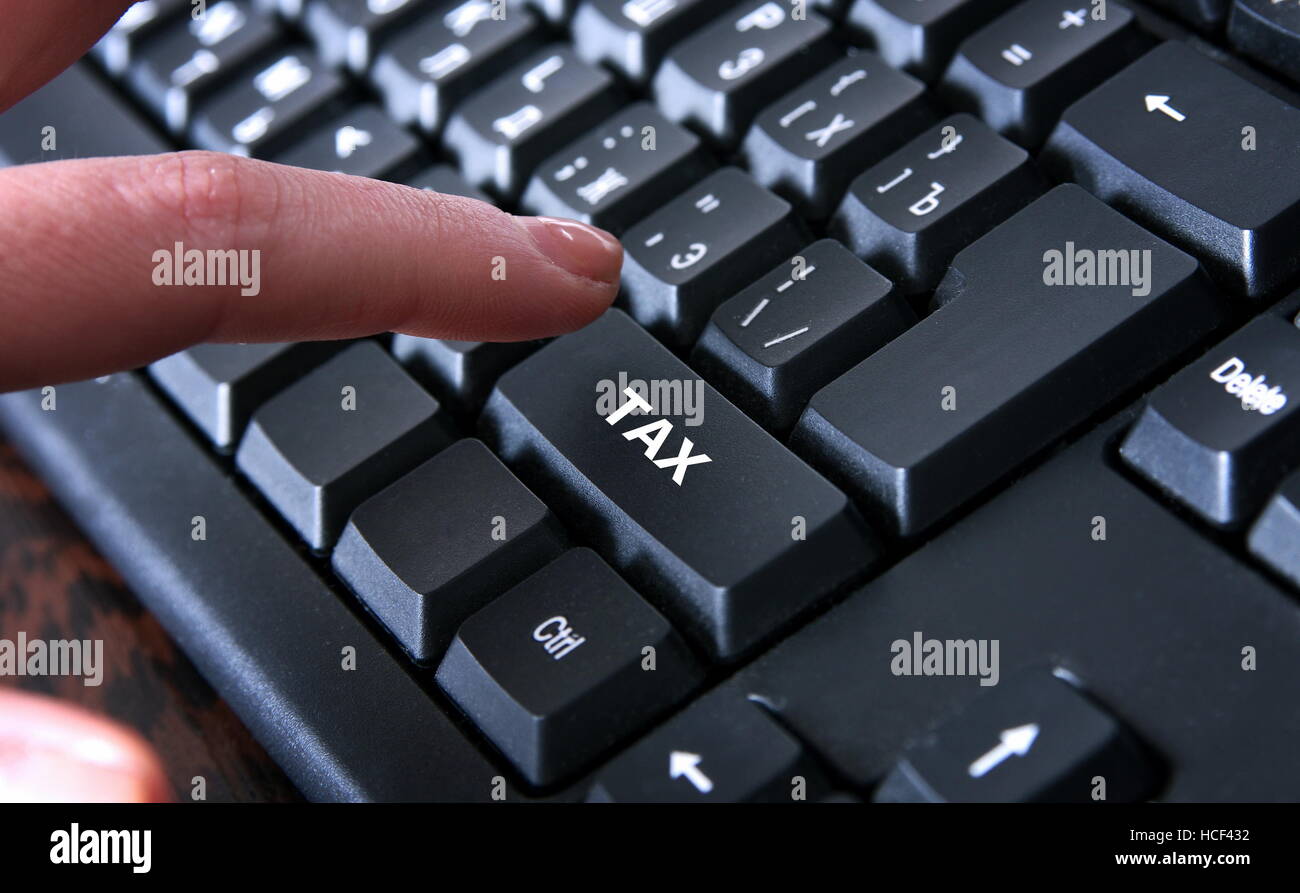 pressing tax return on the keyboard Stock Photo - Alamy