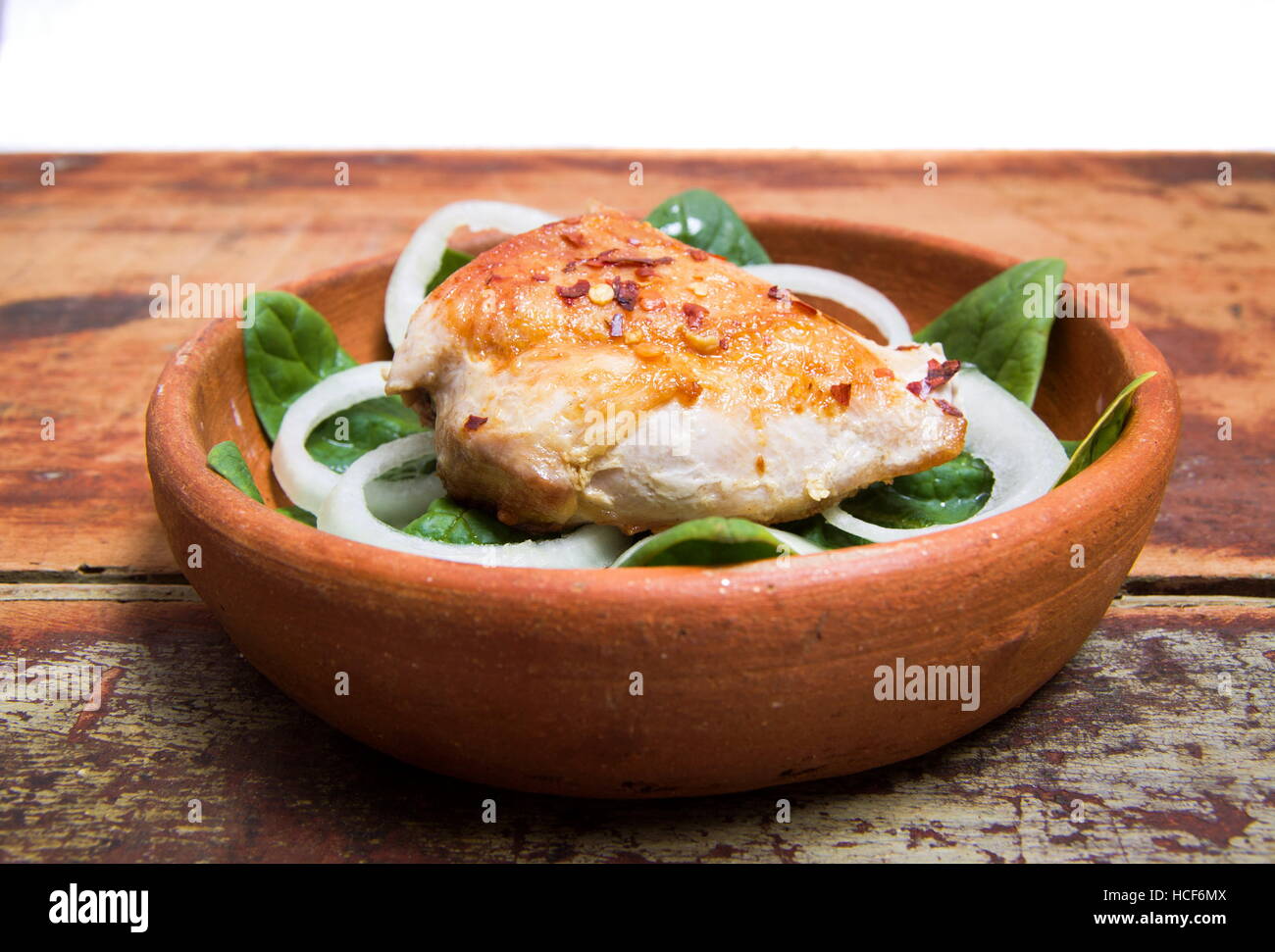 grilled chicken is served in a clay pot Stock Photo - Alamy