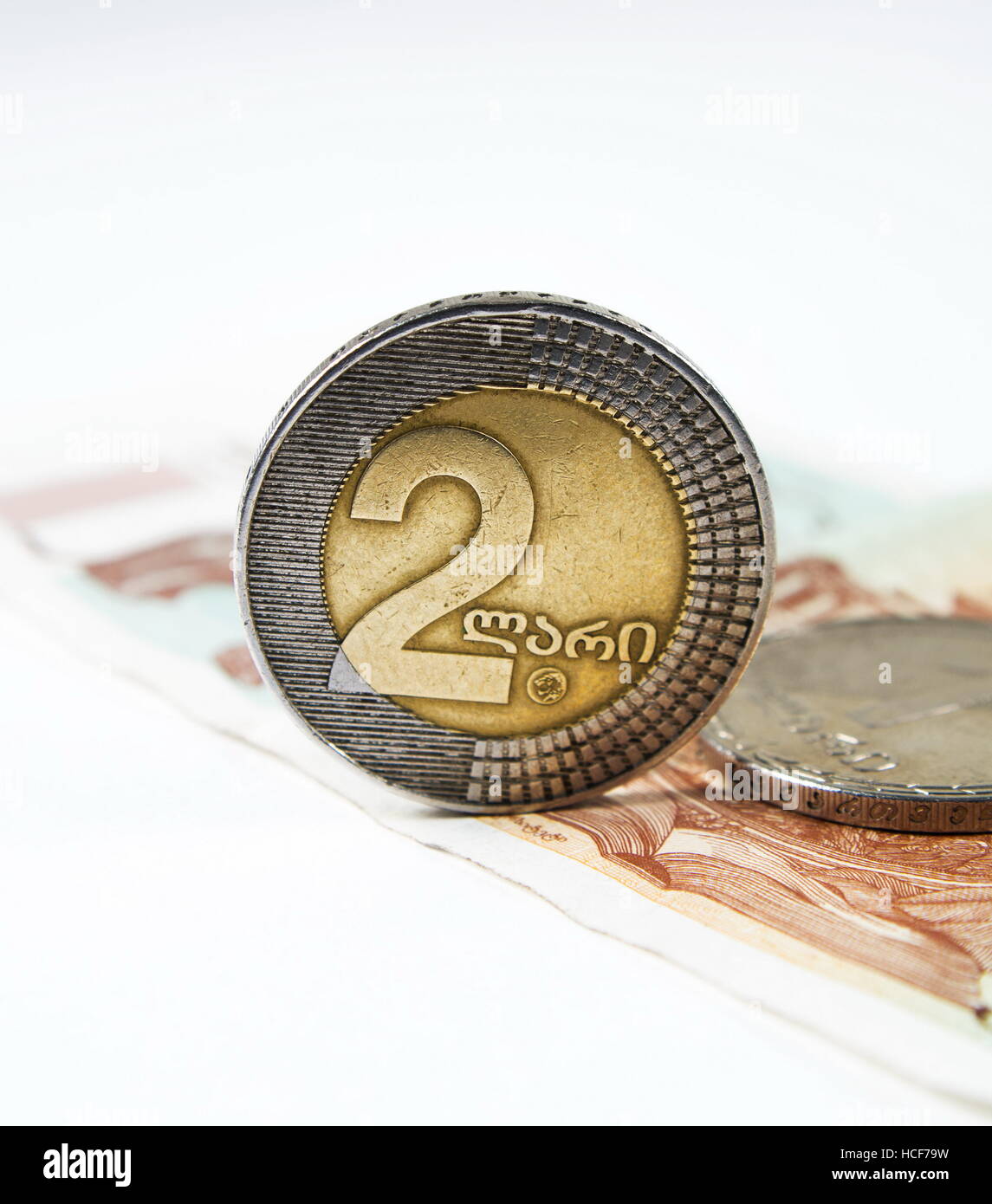 georgian money lari coin on white Stock Photo - Alamy