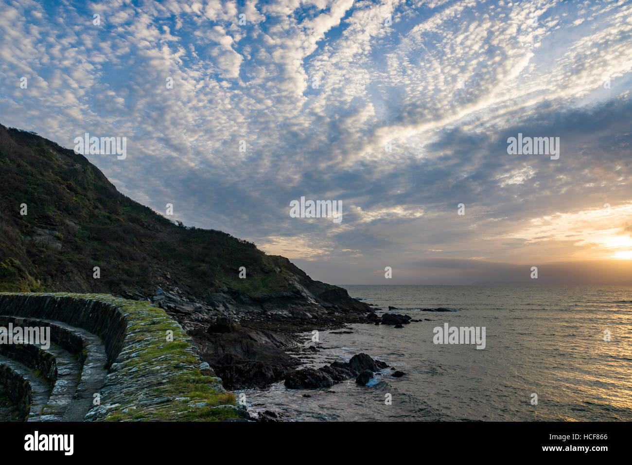 Polkerris Harbour Abstract with setting sun as backdrop Stock Photo - Alamy