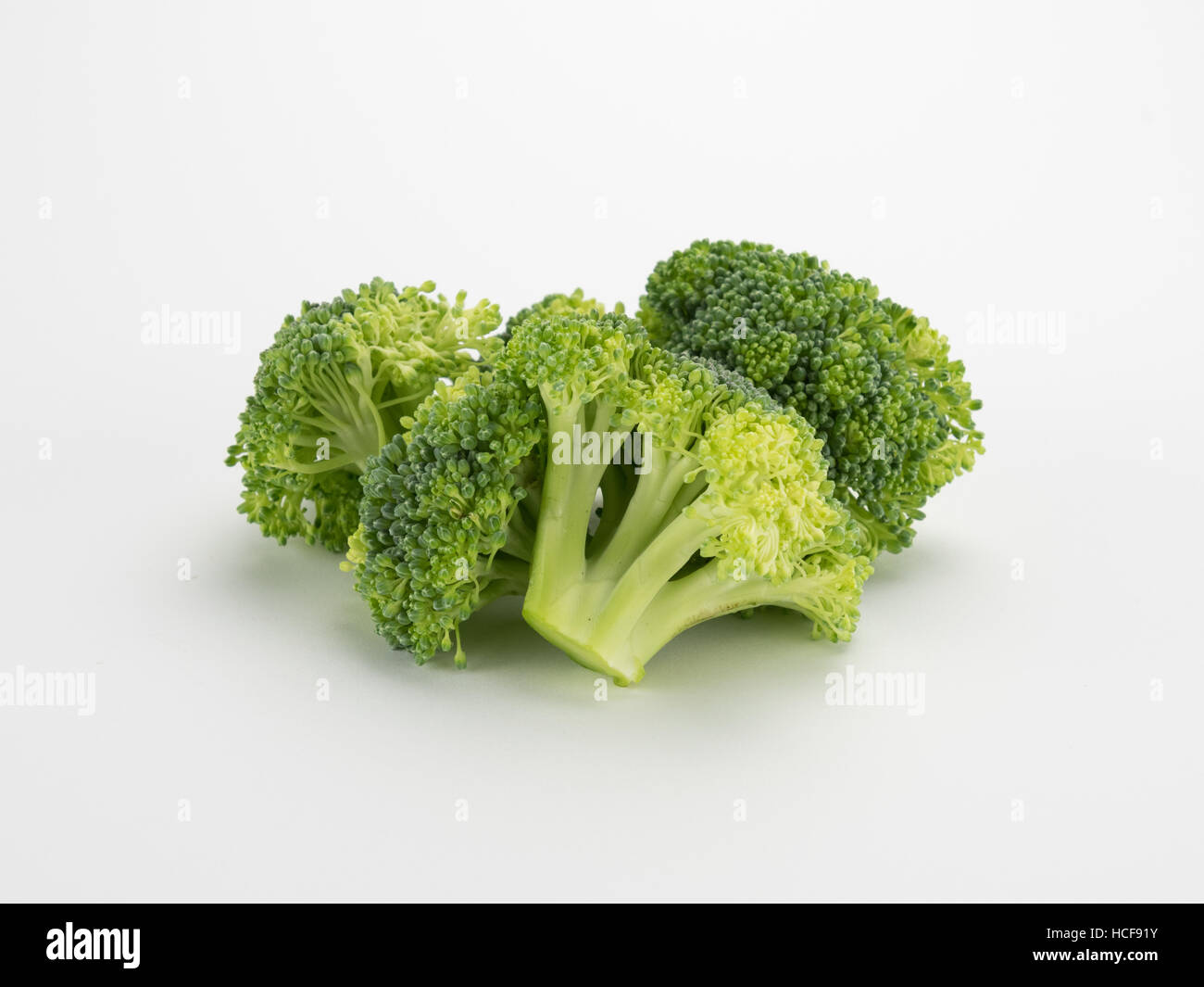 Broccoli Crowns Isolated on White Background Image Stock Photo - Alamy