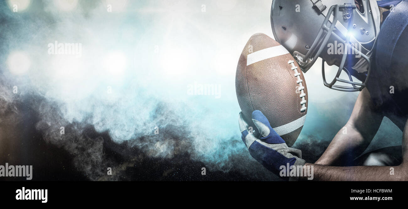 Composite image of close-up of upset american football player with ball ...
