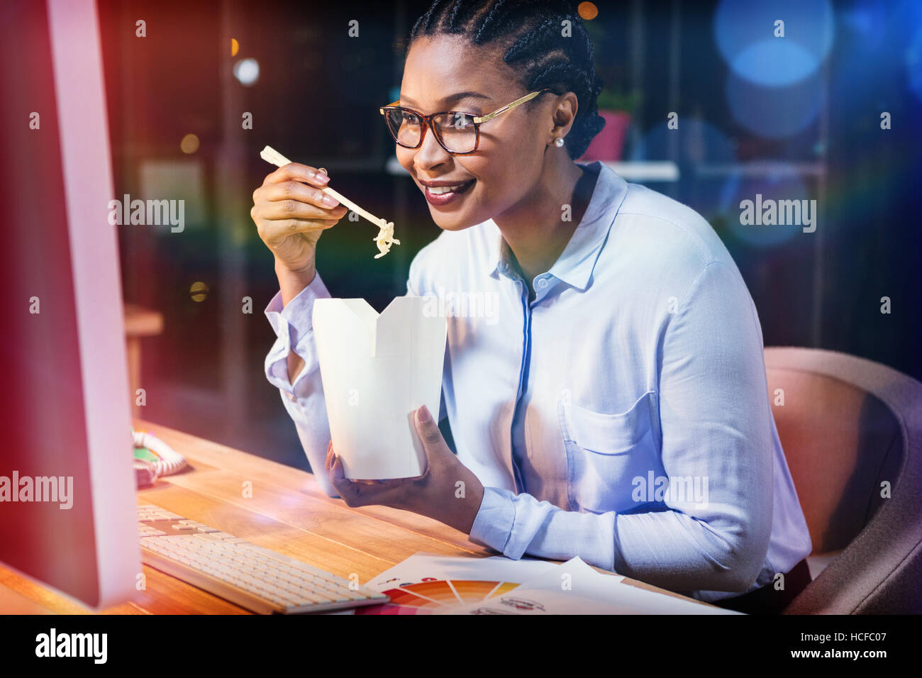 Female eating desk hi-res stock photography and images - Alamy