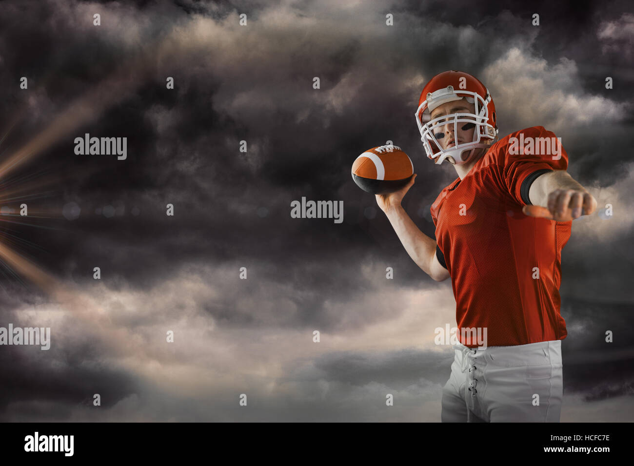 Composite image of american football player throwing football Stock ...
