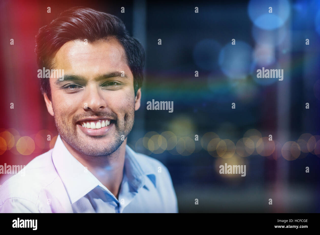 Happy businessman in office Stock Photo - Alamy
