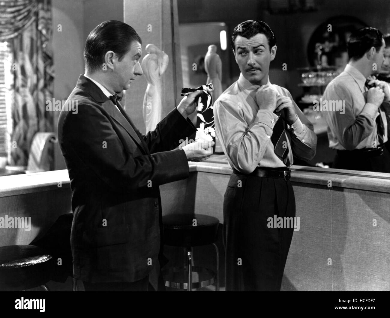 JOHNNY EAGER, Don Costello, Robert Taylor, 1942 Stock Photo - Alamy