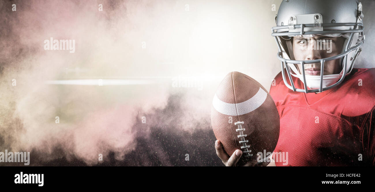 Composite image of portrait of determined american football player with ...