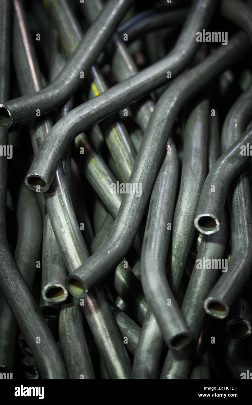 Steel pipe cut and bent Stock Photo - Alamy