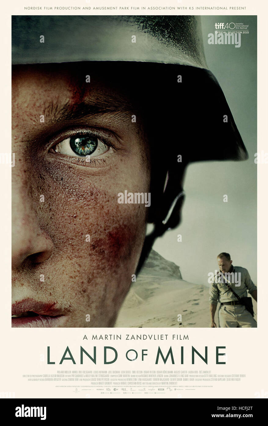 LAND OF MINE, (aka UNDER SANDET), poster, from left: Louis Hofmann, Roland Muller, 2015. ©Sony ...