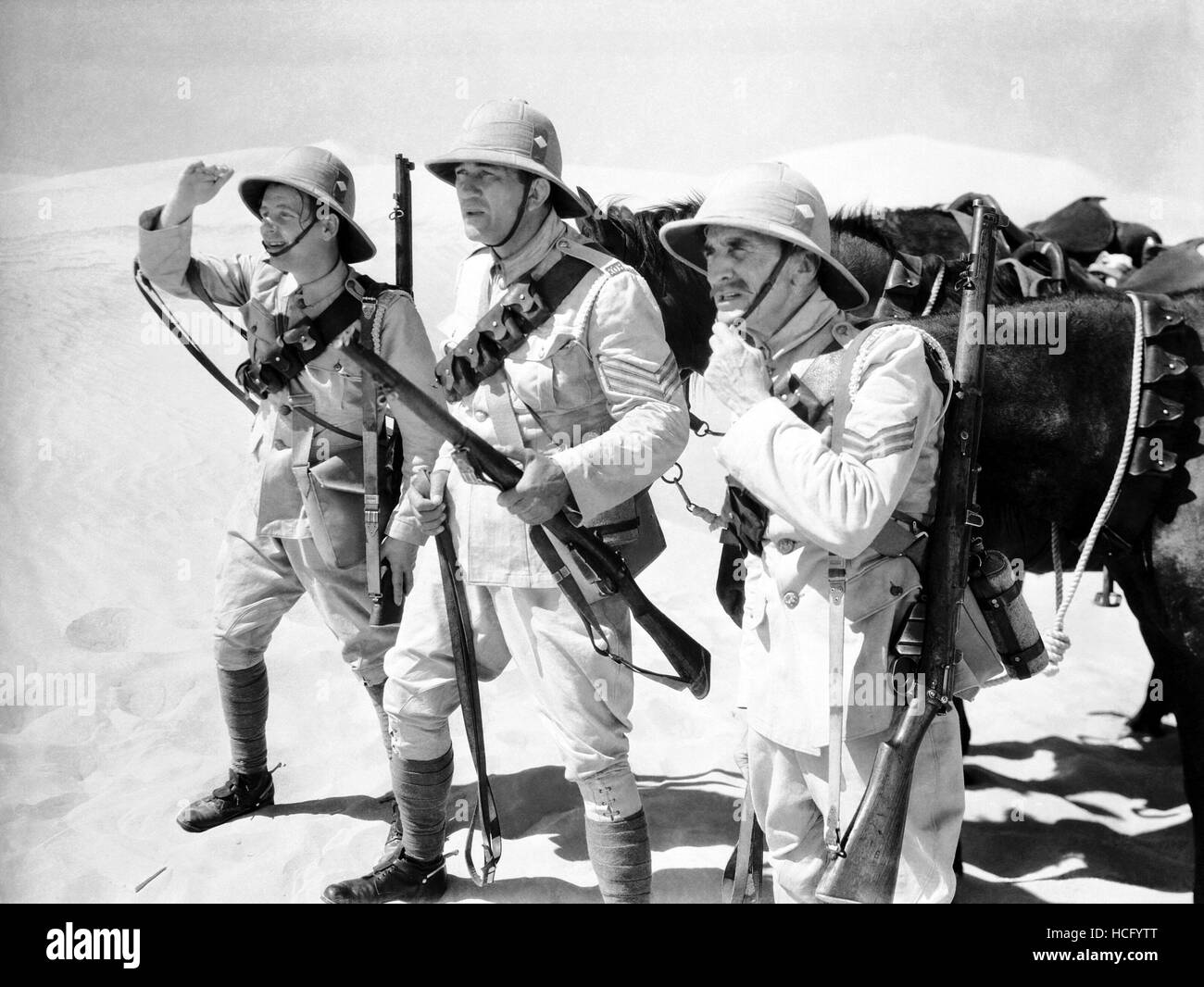 THE LOST PATROL, from left: Wallace Ford, Victor McLaglen, Brandon ...