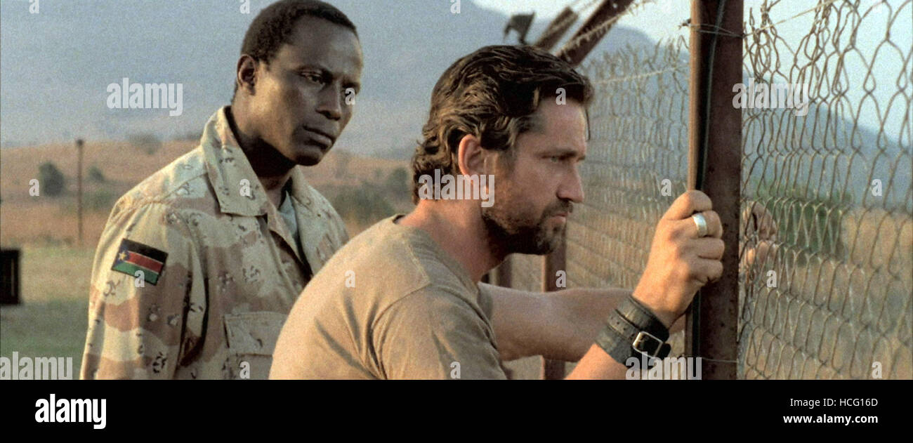 MACHINE GUN PREACHER, from left: Souleymane Sy Savane, Gerard Butler ...