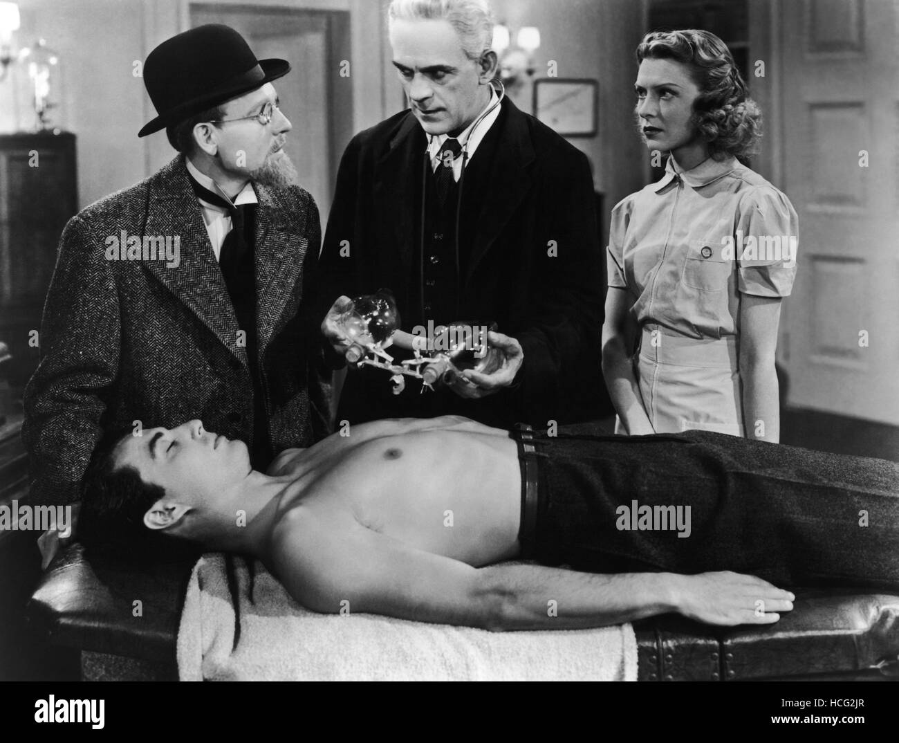 THE MAN THEY COULD NOT HANG, Robert Wilcox (on table), Byron Foulger ...