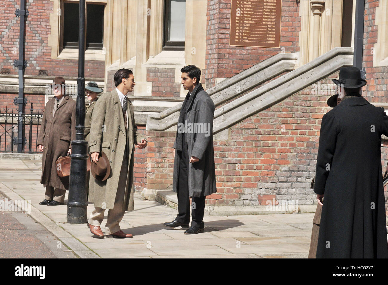 THE MAN WHO KNEW INFINITY, Dev Patel (gray coat), 2015. © IFC Films ...