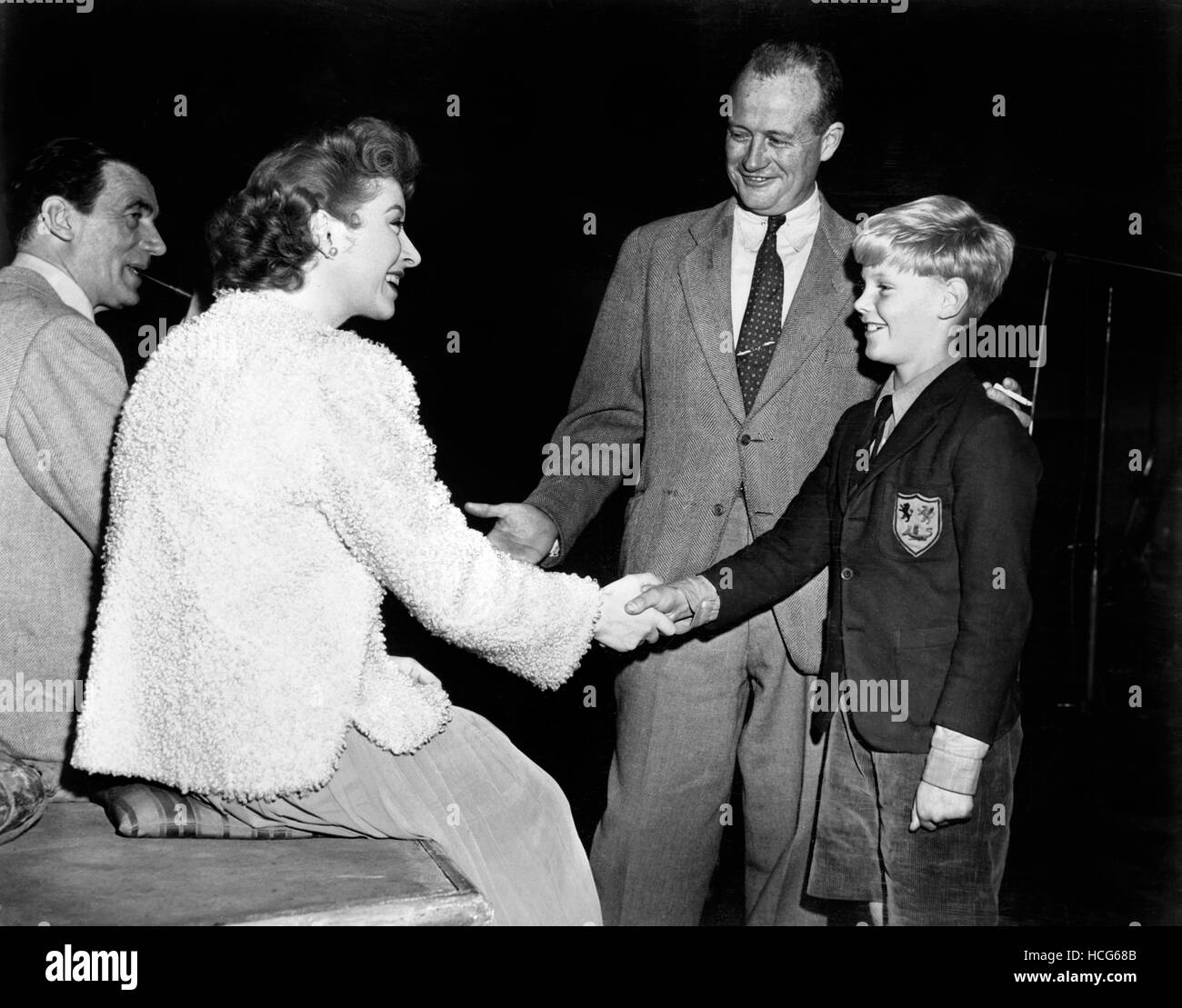 THE MINIVER STORY, Greer Garson, James Fox (r.), on set, 1950 Stock ...