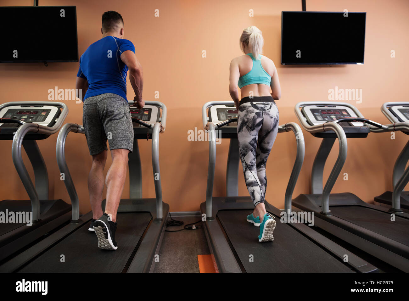 Morning jogging on the treadmill Stock Photo - Alamy