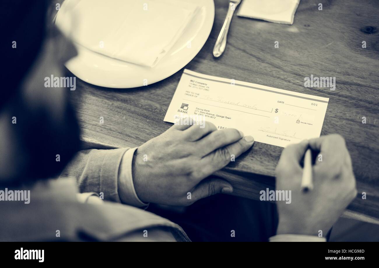 Business People Cheque Money Concept Stock Photo - Alamy