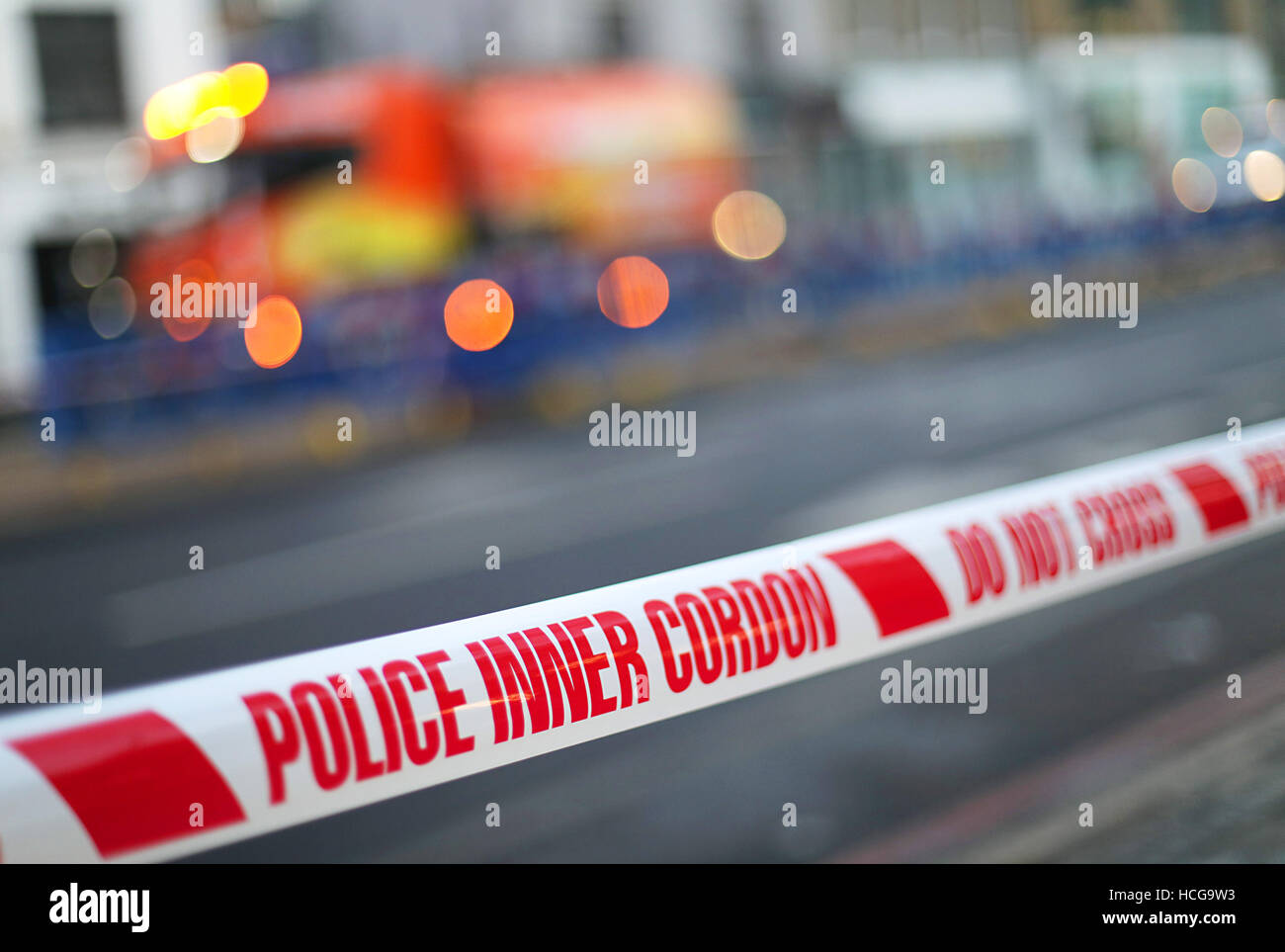 A police inner cordon tape on Upper Street in Islington, London. PRESS ...