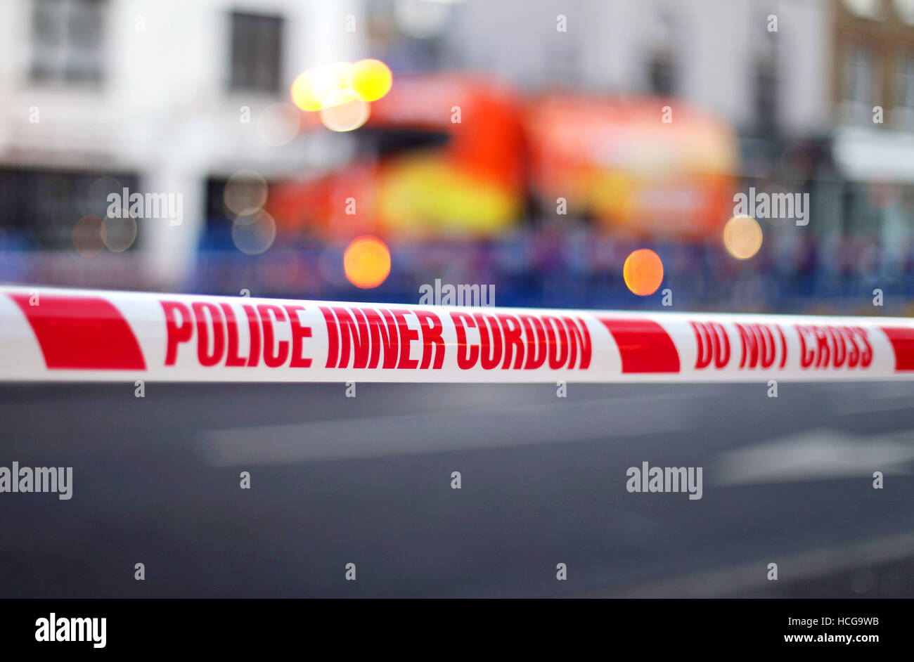 A police inner cordon tape on Upper Street in Islington, London. PRESS ...